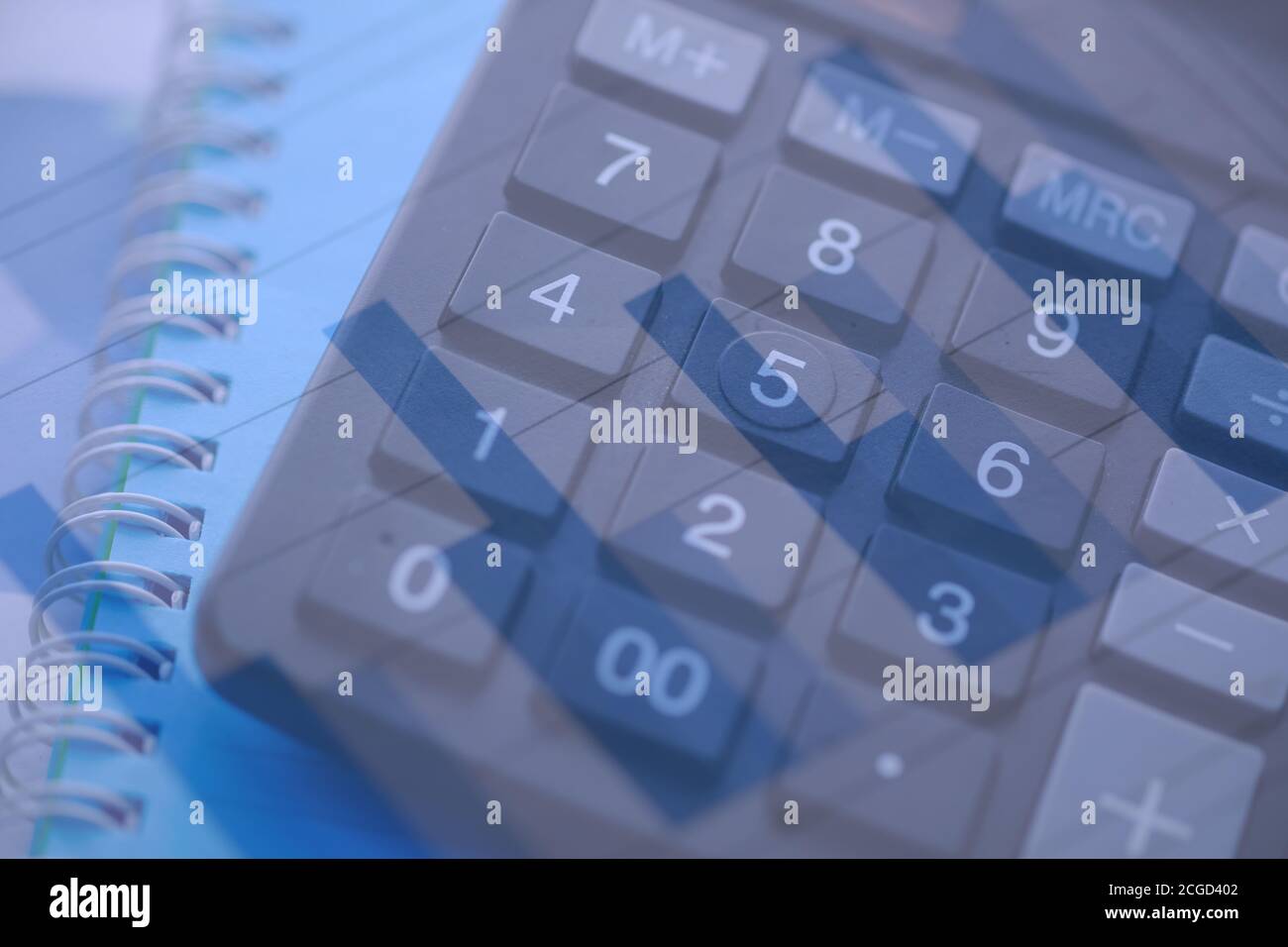double exposure of financial chart and calculator Stock Photo - Alamy