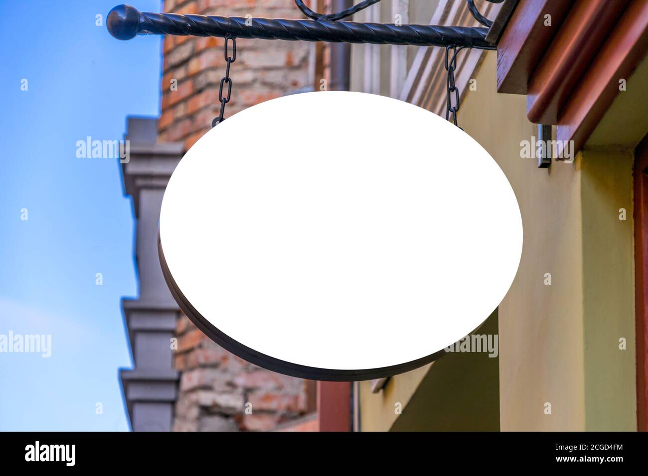 Mock up sign. Blank white rounded signage on a building wall Stock ...