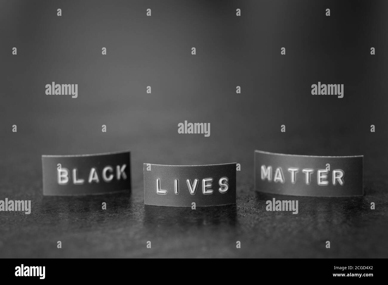 Labels on black background Black and White Stock Photos & Images - Alamy