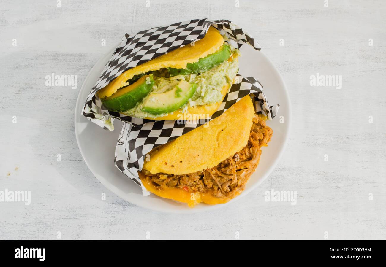 Arepa on a white background, top view Stock Photo - Alamy