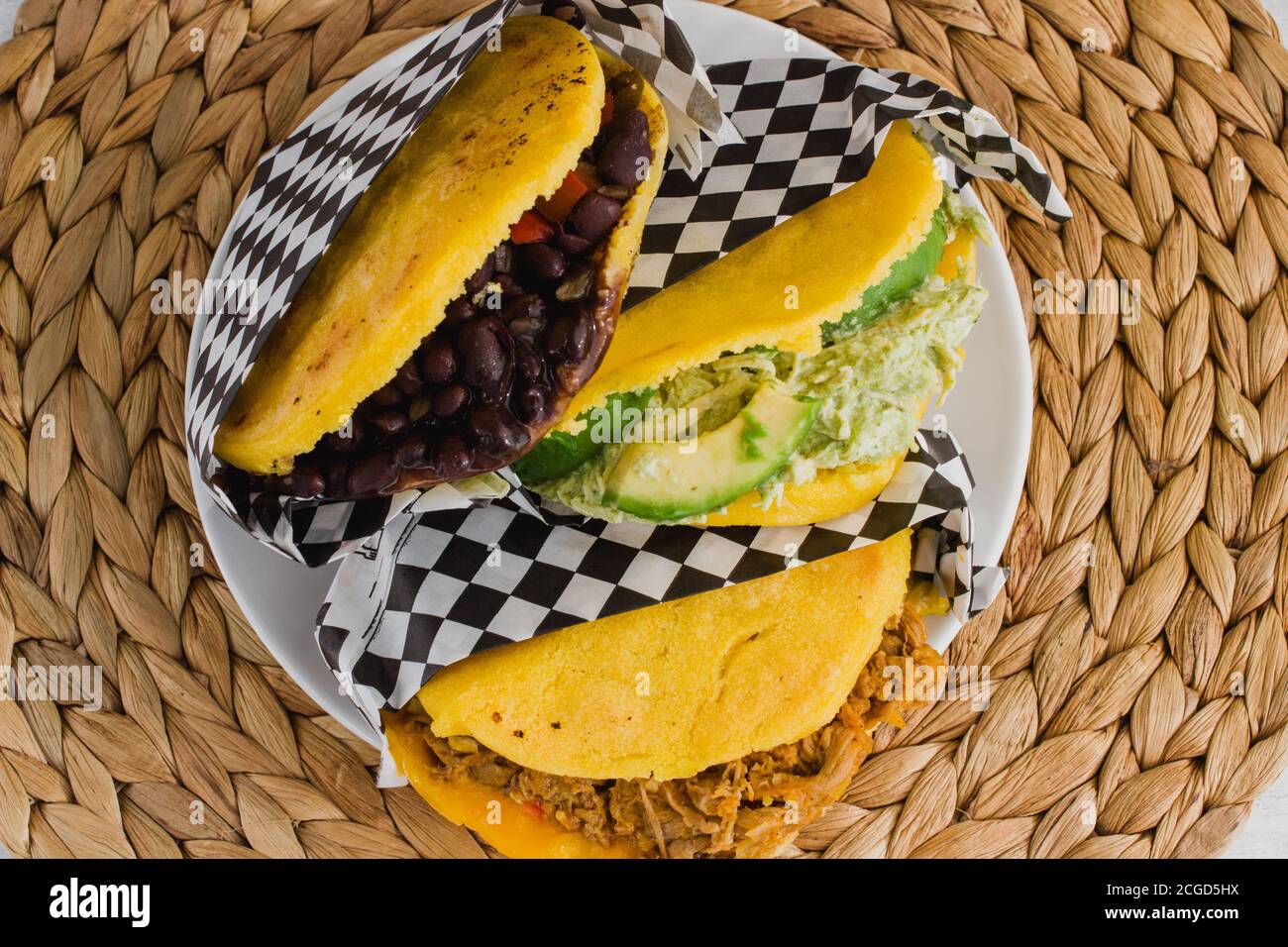 Beef, avocado and beans arepas, traditional from Venezuela Stock Photo ...