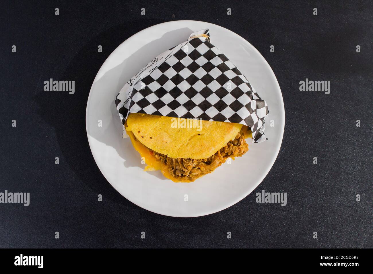 top view arepa on a dish. Black and white design Stock Photo - Alamy