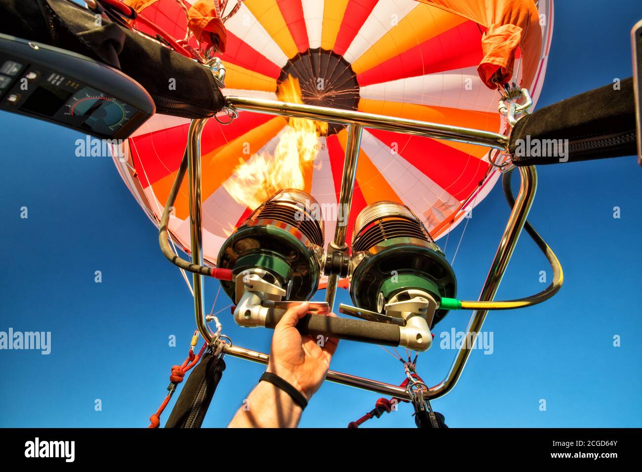 Hot air balloon with gas power accelerators, taking off Stock Photo - Alamy