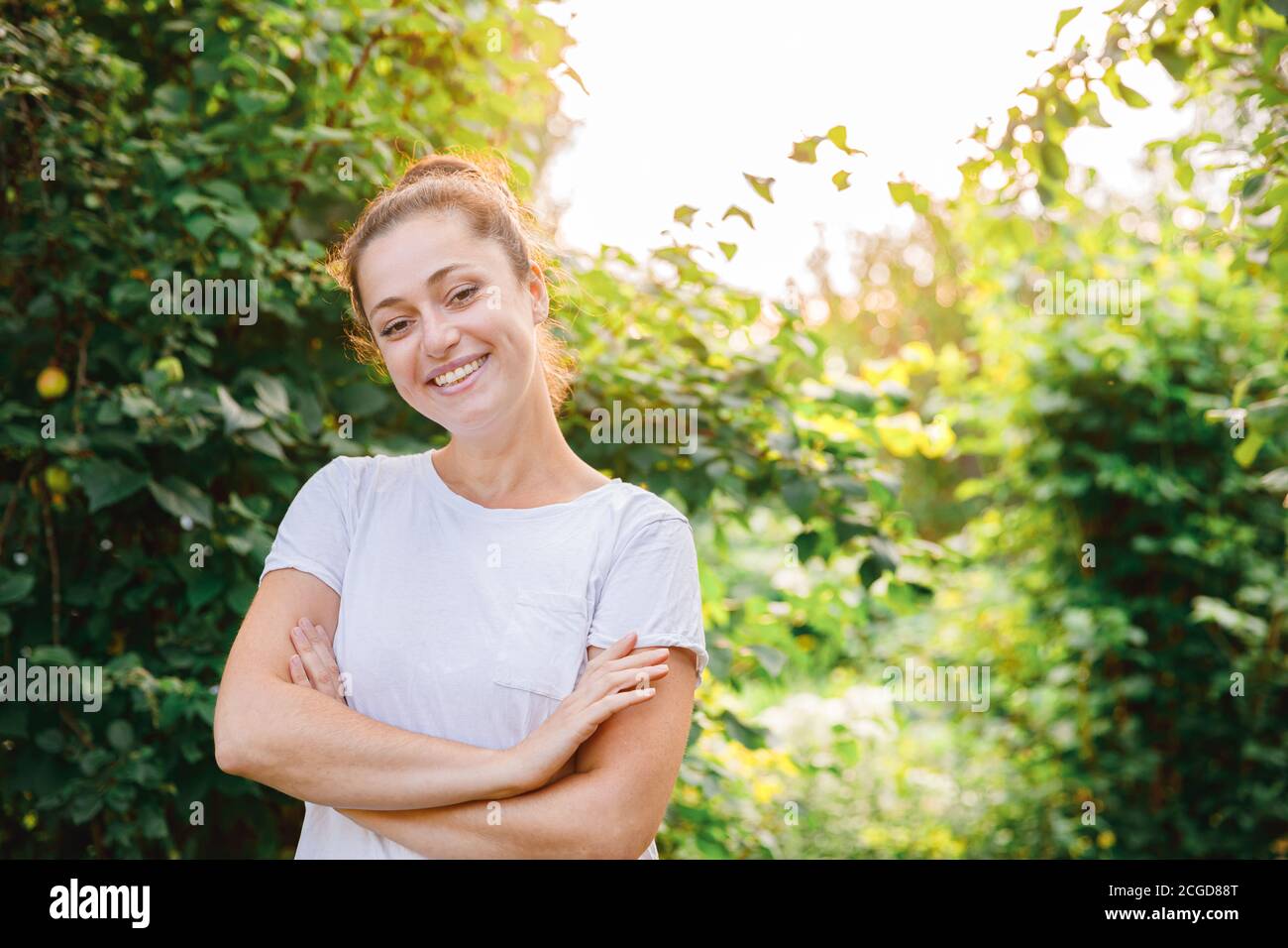 Happy girl smiling outdoor. Beautiful young brunete woman with brown ...