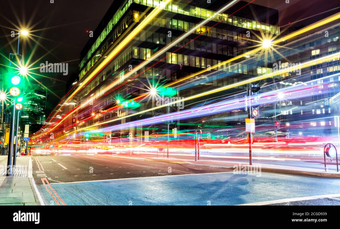 Blur traffic lights in modern city, long exposure. Fast cars created ...