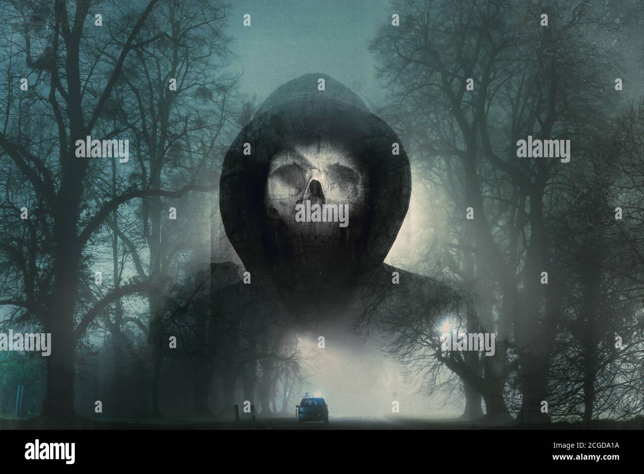A double expsoure of a scary hooded figure with a skull for a face ...