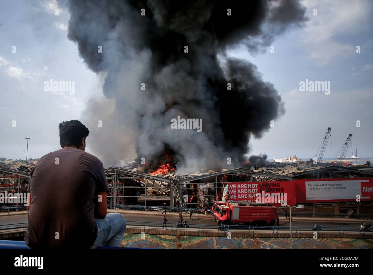 Beirut, Lebanon. 10th Sep, 2020. Firefighters try to douse flames ...