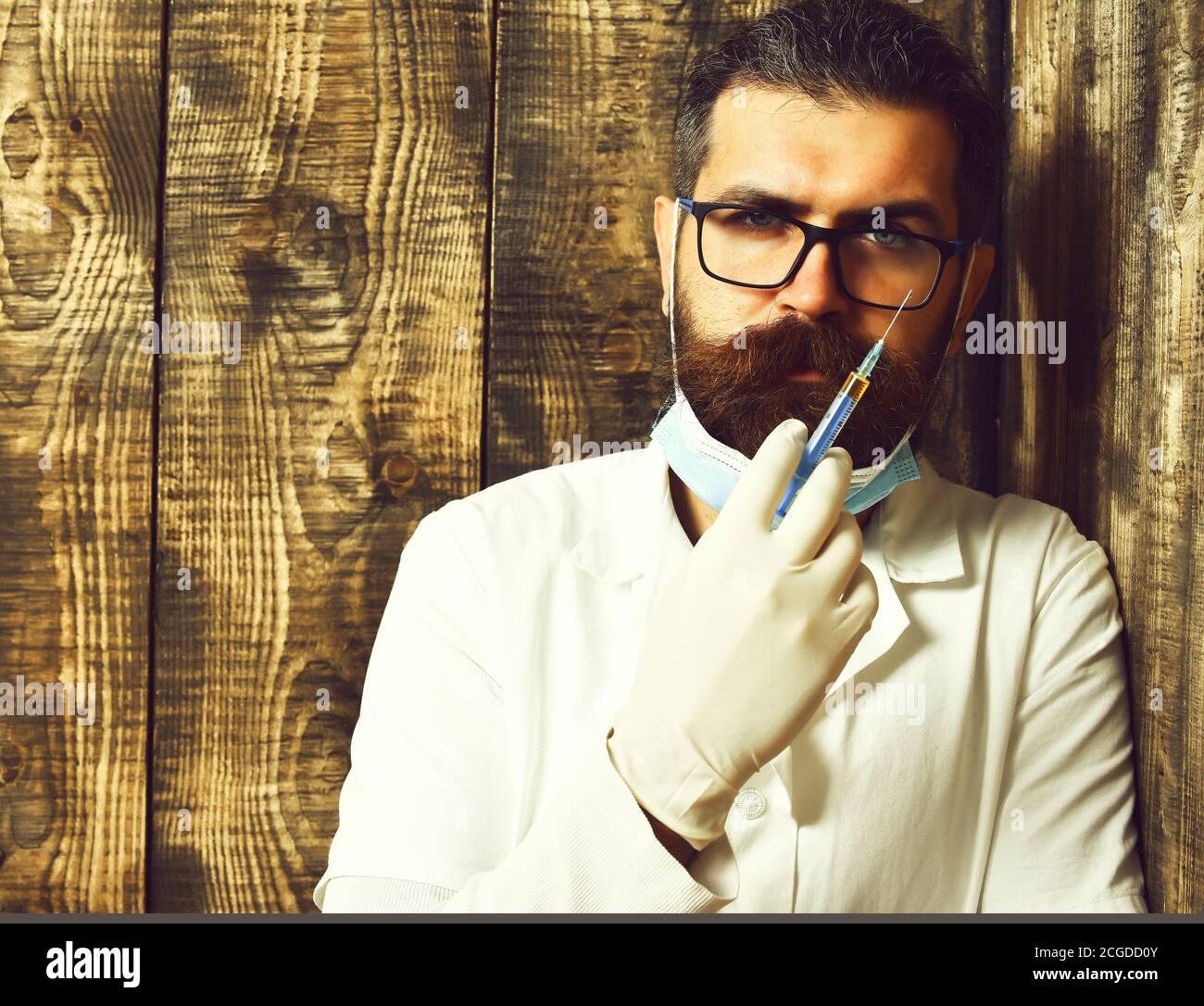 Bearded man, long beard. Brutal caucasian doctor or unshaven hipster ...