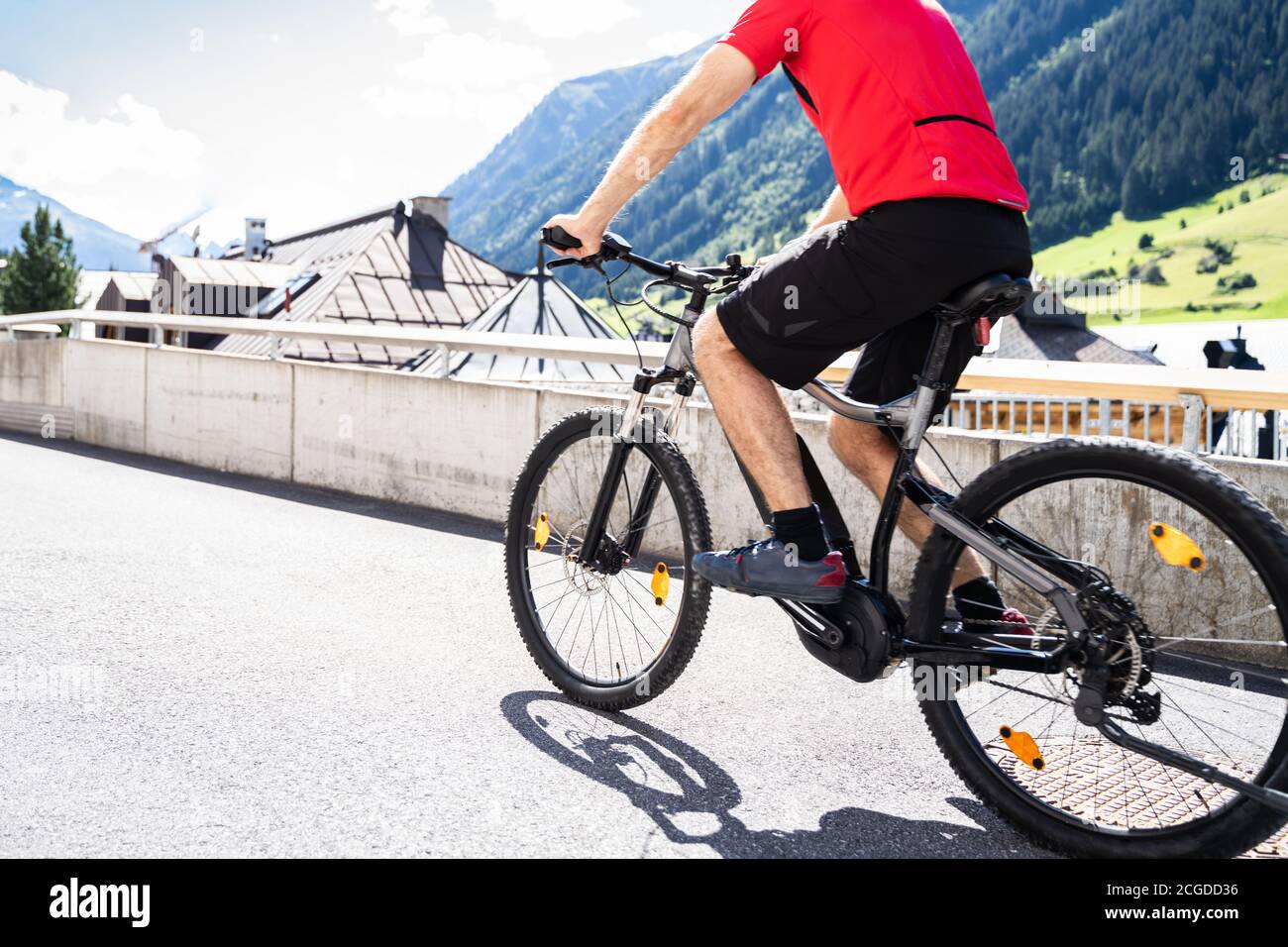 Man riding an e bike hi-res stock photography and images - Alamy