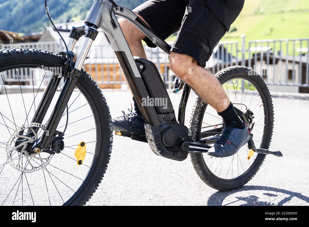 Man riding an e bike hi-res stock photography and images - Alamy