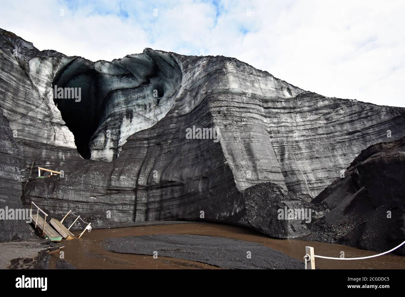 The entrance to Katla Ice Cave in the Kotlujokull Glacier. A wooden ...