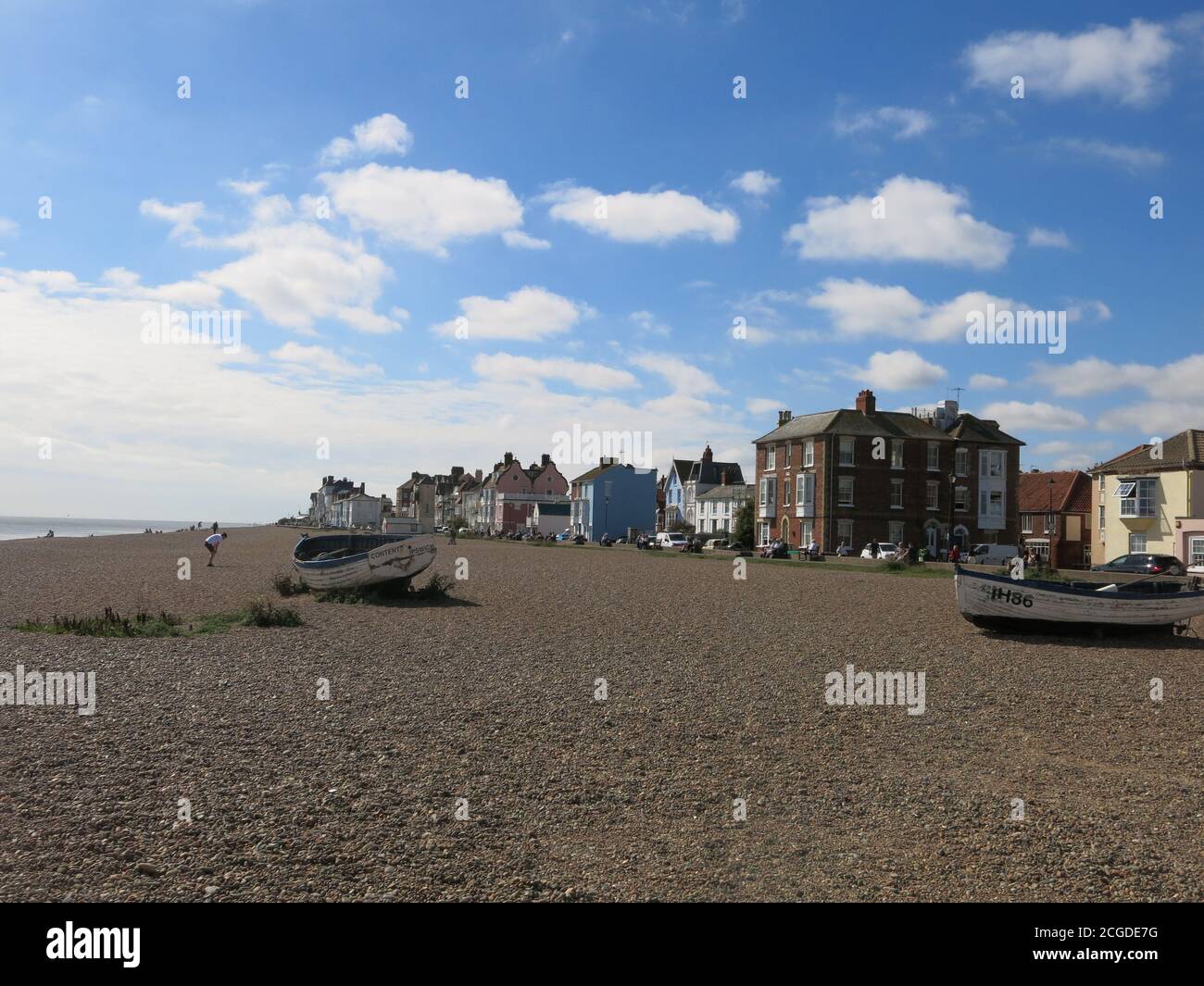 The long shingle beach with the town of Aldeburgh in the distance, a ...