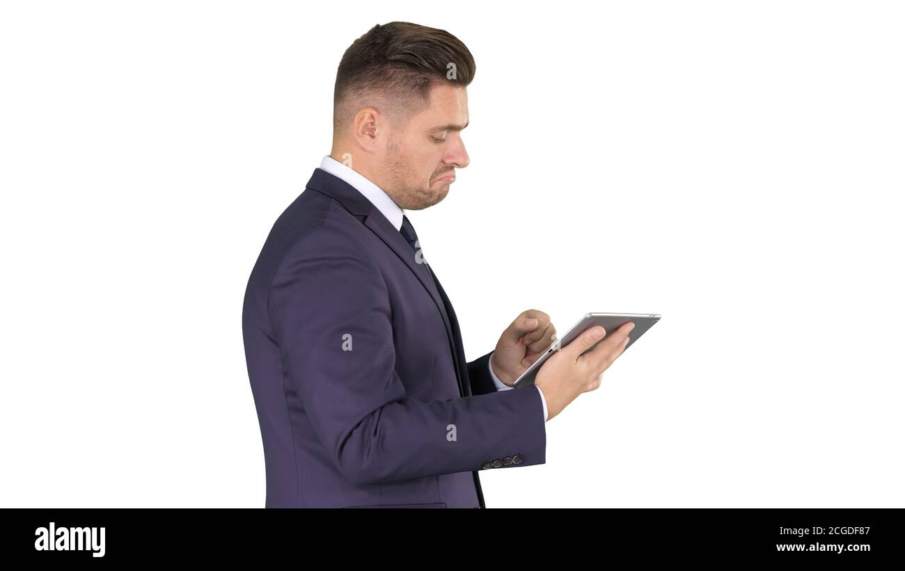 Smart senior businessman using a technology tablet on white background ...