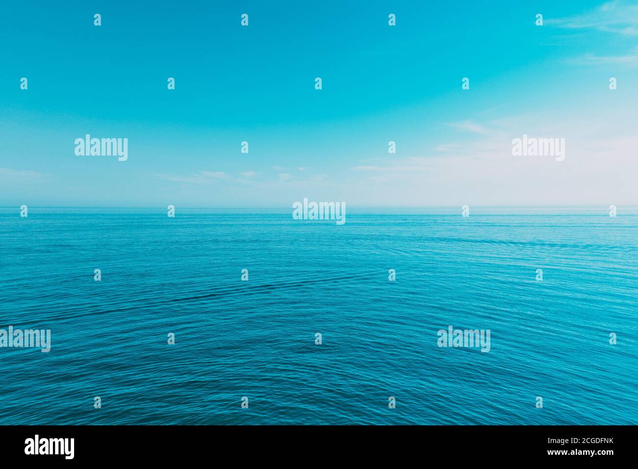 Calm Sea Ocean And Blue Sky Natural Background Backdrop Stock Photo - Alamy