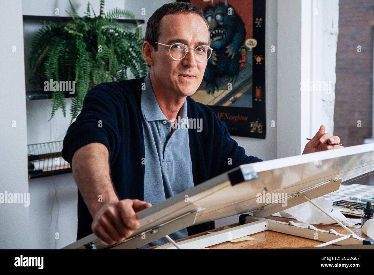Author and illustrator Colin McNaughton in his studio in Covent Garden ...