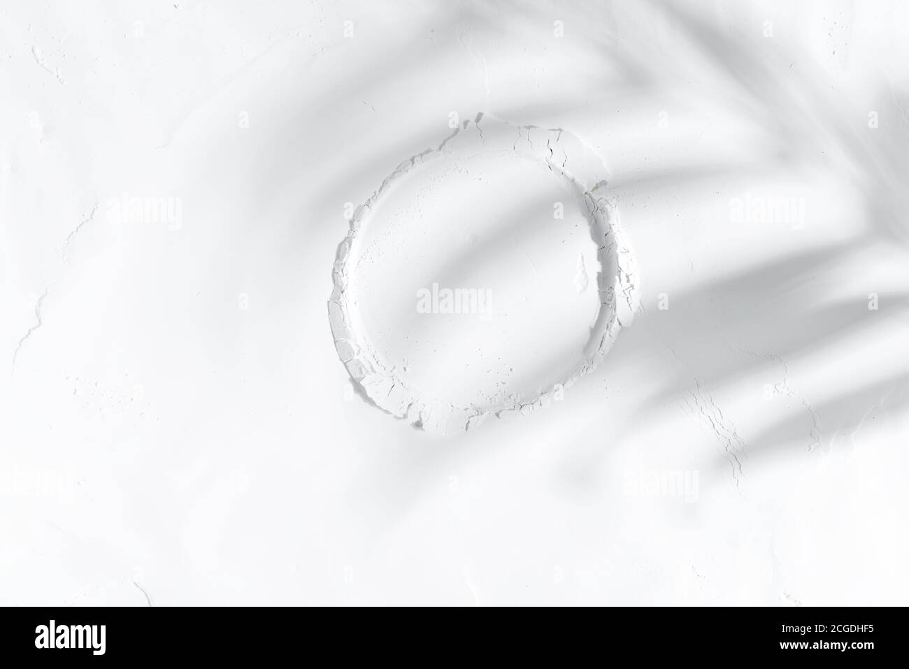 Decorative round frame from white powder, flour or grinded chalk on the ...