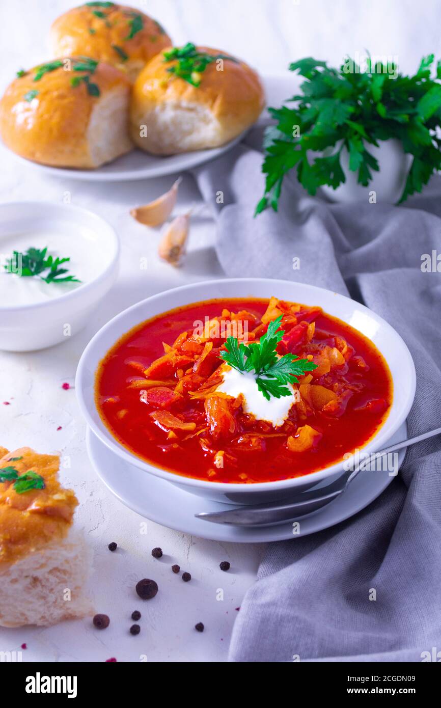 Ukrainian traditional borsch with garlic buns Stock Photo - Alamy