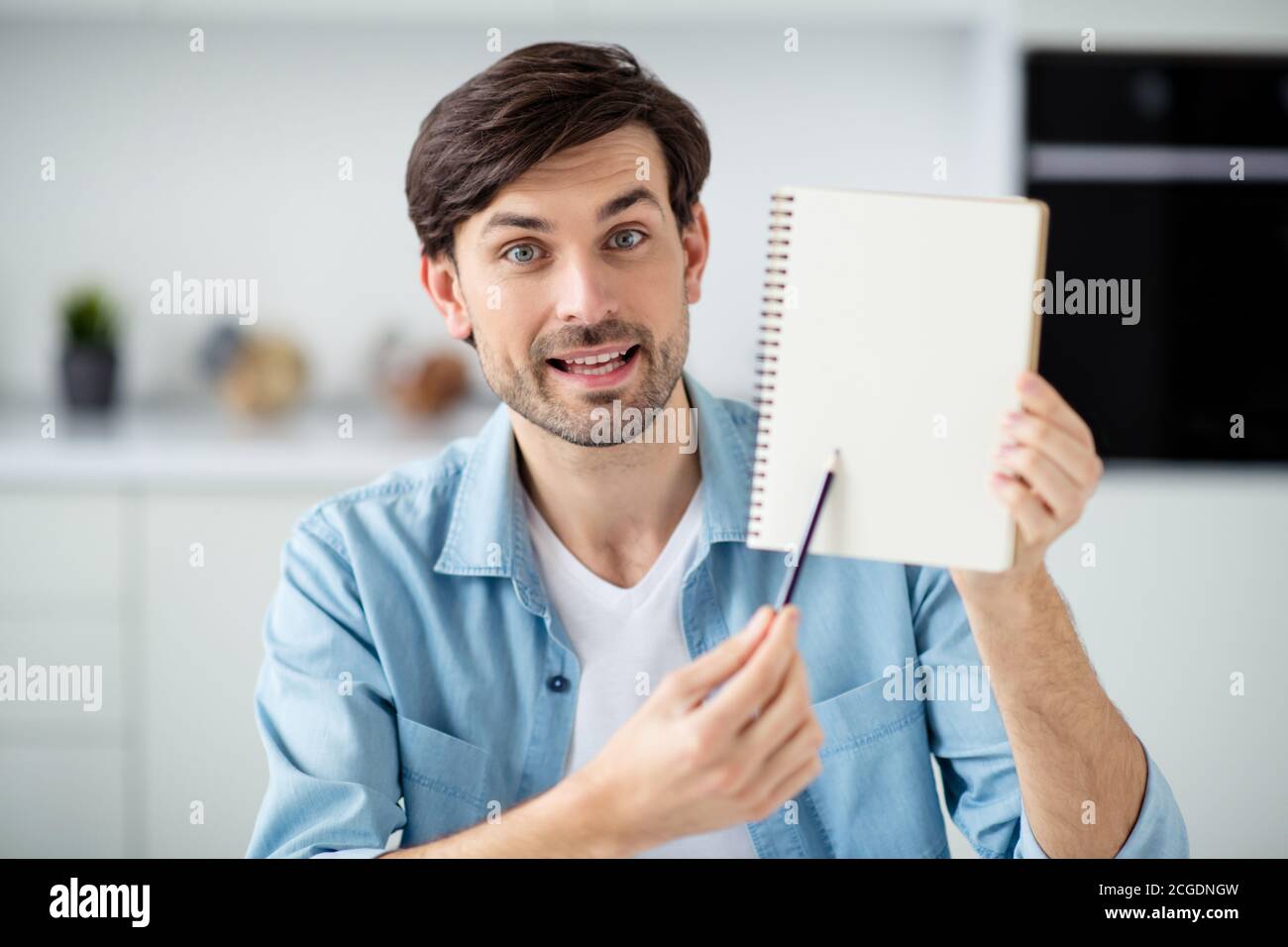 Closeup photo of young handsome guy internet online meeting video call ...