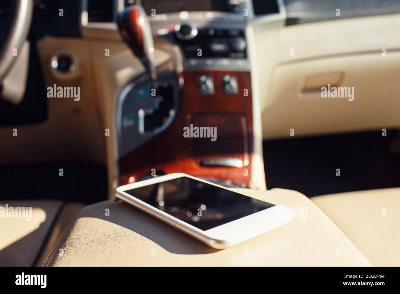 smart phone phone on the car seat dashboard. Lifestyles photo in car ...