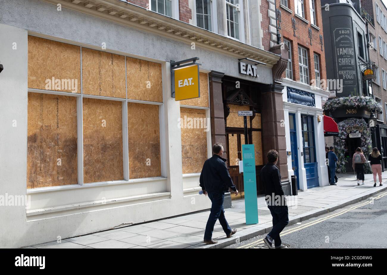 A boarded up EAT. store in London Stock Photo - Alamy