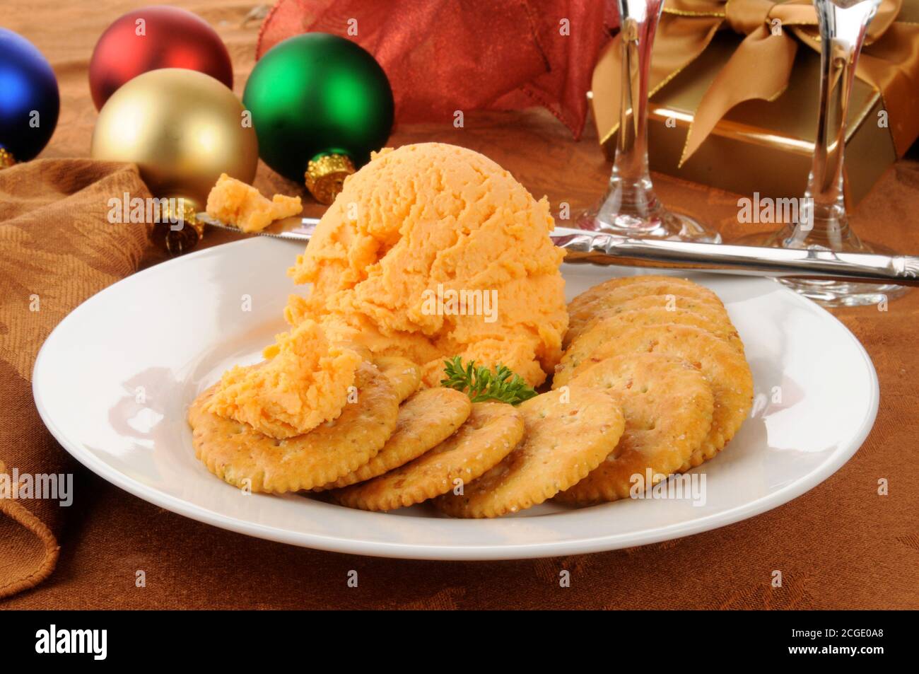 A cheddar cheese ball and crackers at Christmas Stock Photo - Alamy