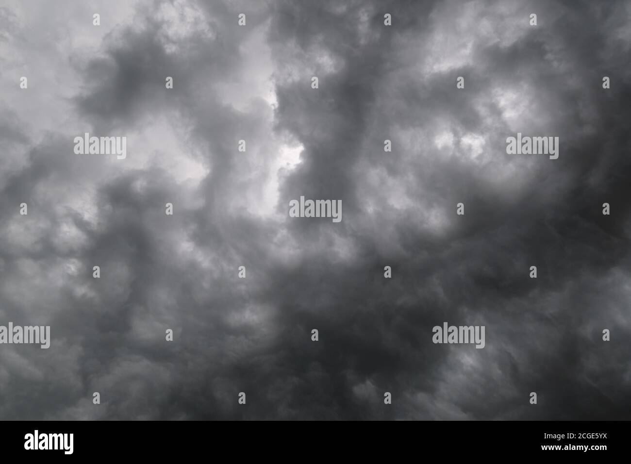 Dark dramatic cloudy overcast sky with thunderstorm clouds. Natural bad ...