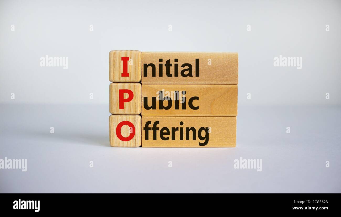 Concept word 'IPO' - 'initial public offering' on cubes and blocks on a ...