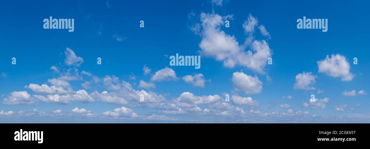 White cumulus clouds in blue sky panoramic high resolution background Stock Photo - Alamy