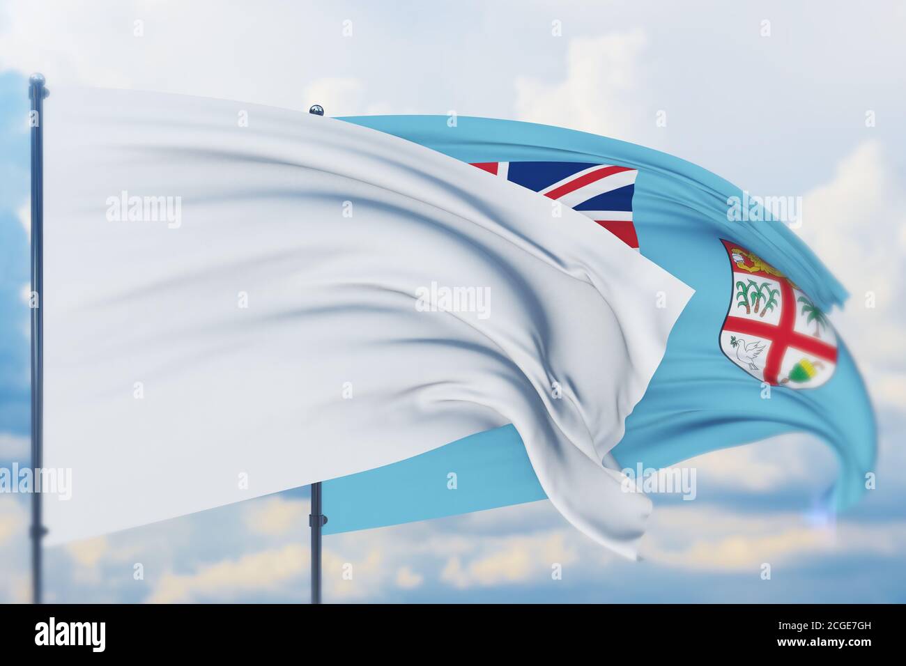 White flag on flagpole waving in the wind and flag of Fiji. Closeup ...