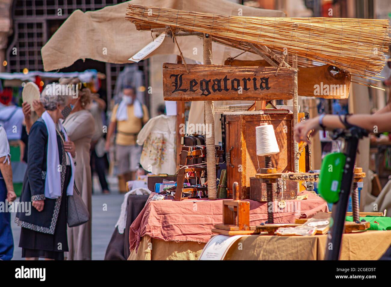 Detail of a medieval street market in Verona in Italy Stock Photo - Alamy