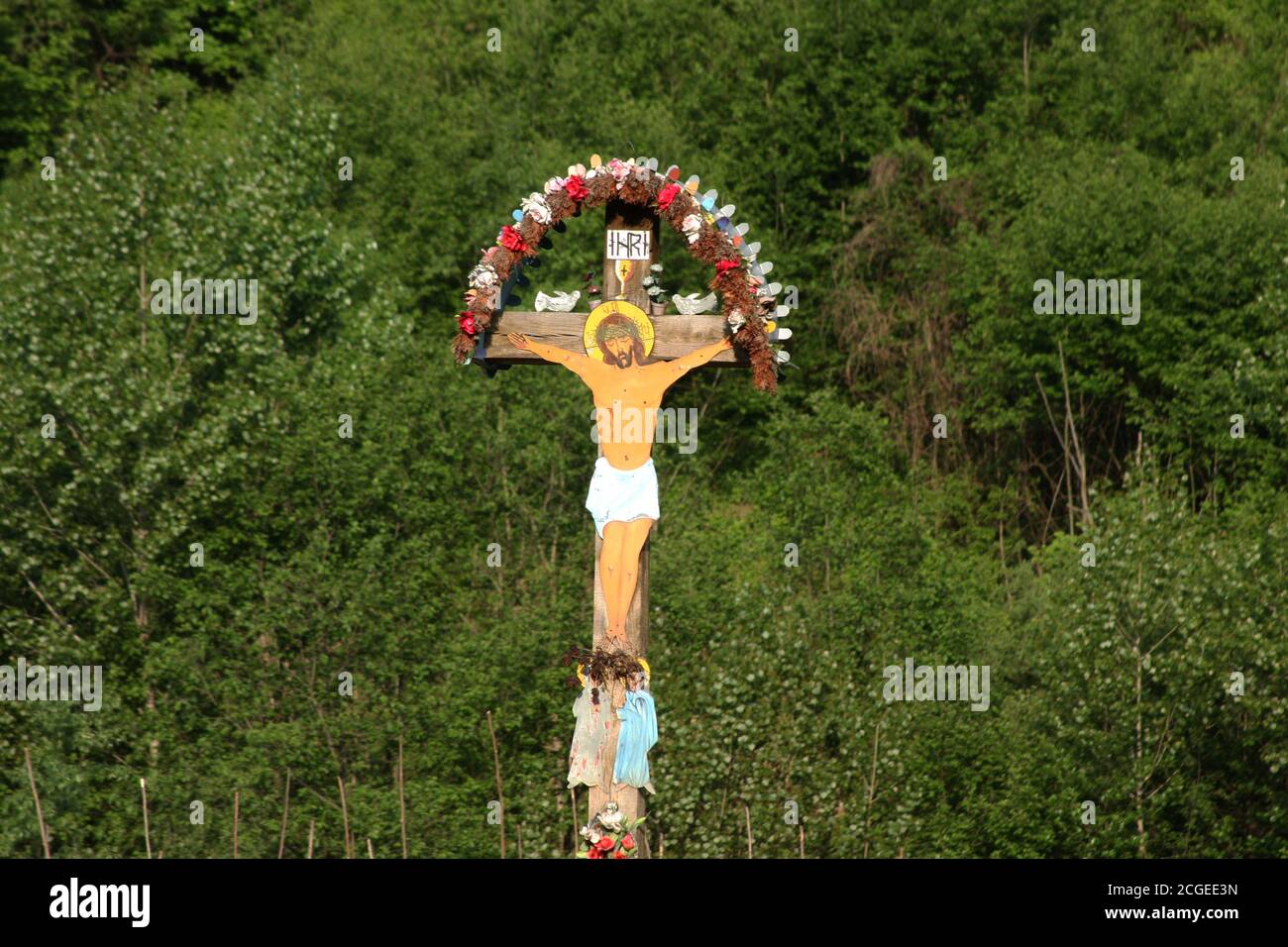 Roadside crucifix in Romania's countryside. Traditionally handmade ...