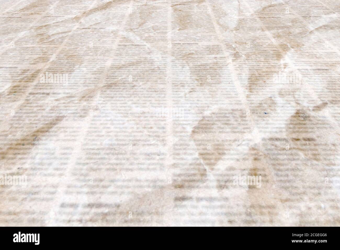 Newspaper with old unreadable text. Vintage blurred crumpled paper news ...