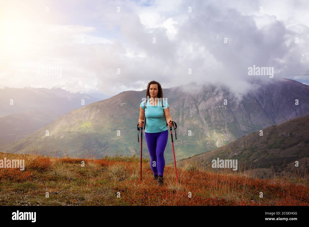 Adventurous Girl Hiking up the Nares Mountain Stock Photo - Alamy