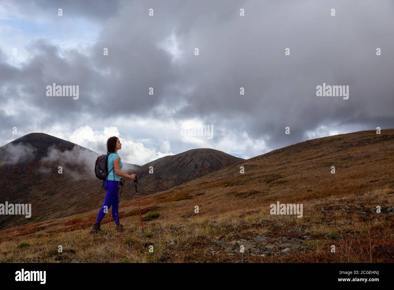 Adventurous Girl Hiking up the Nares Mountain Stock Photo - Alamy