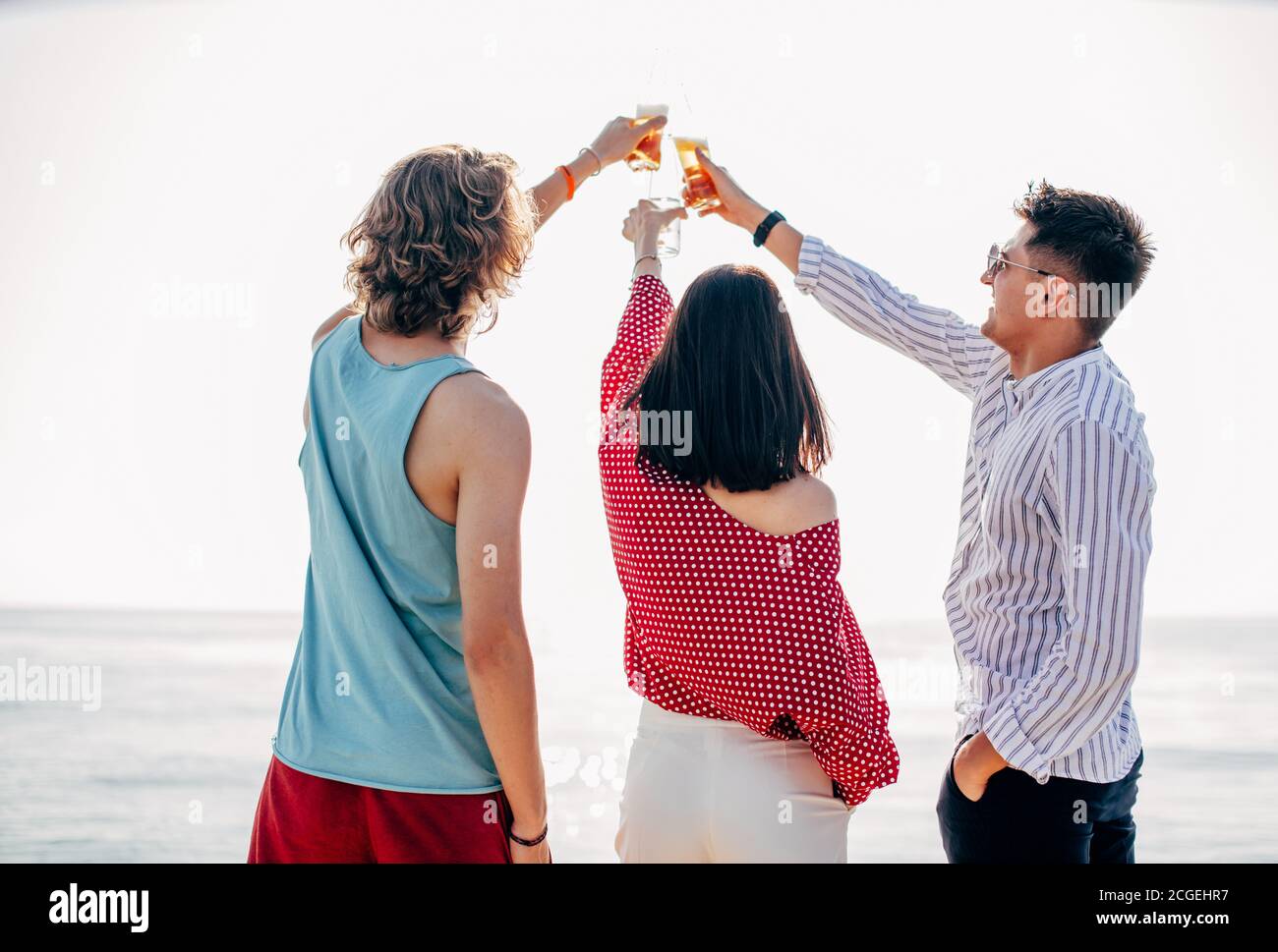 Friends Beach Party Drinks Toast Celebration Concept on sea Stock Photo ...