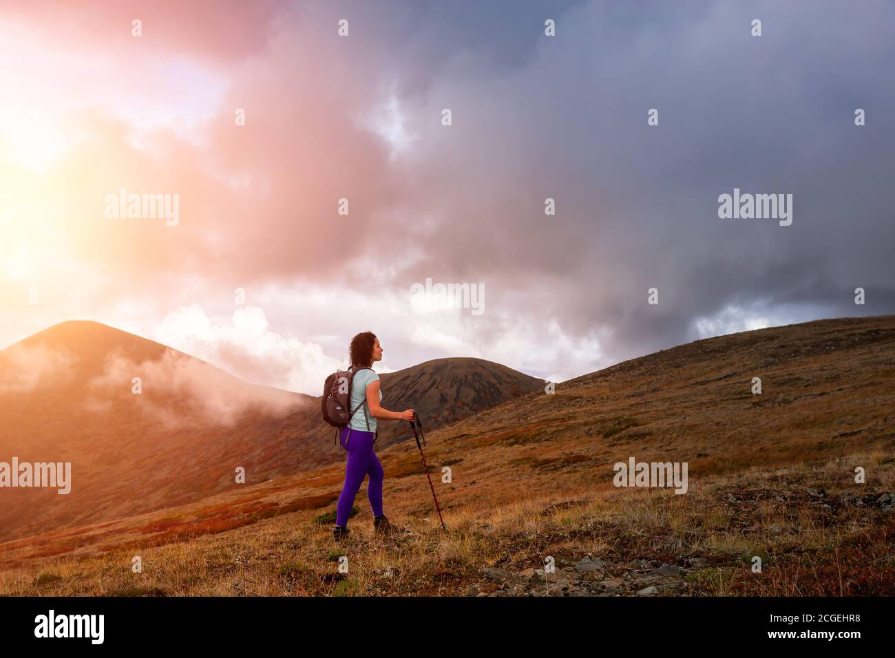 Adventurous Girl Hiking up the Nares Mountain Stock Photo - Alamy