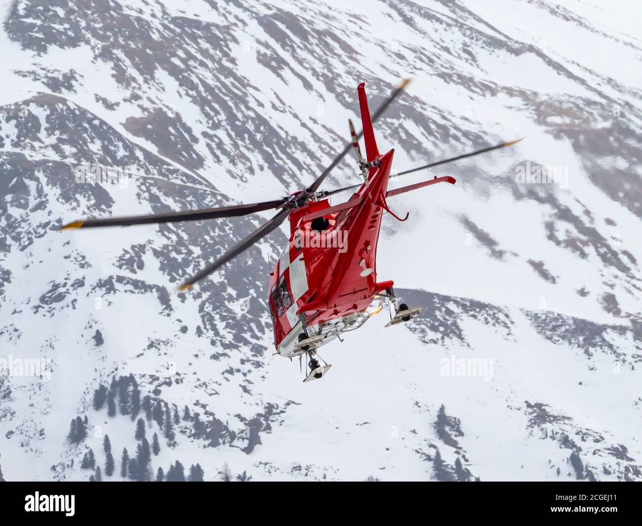 Alpine rescue helicopter in winter Stock Photo - Alamy