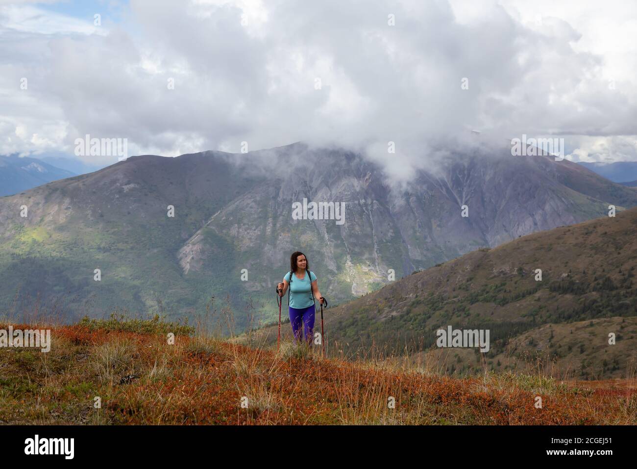 Adventurous Girl Hiking up the Nares Mountain Stock Photo - Alamy