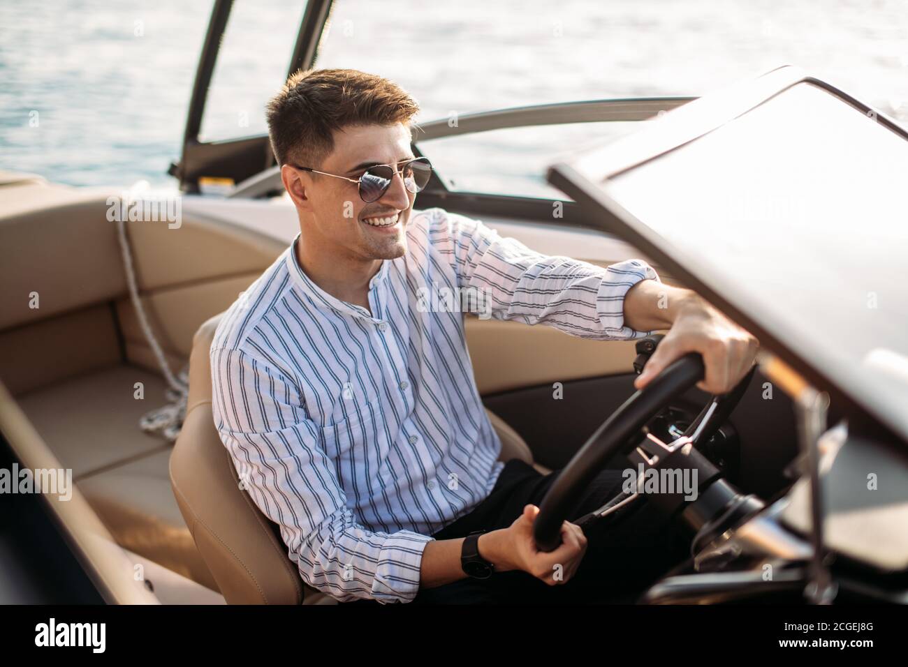 Serious handsome business man dressed in classy style, with sunglasses ...