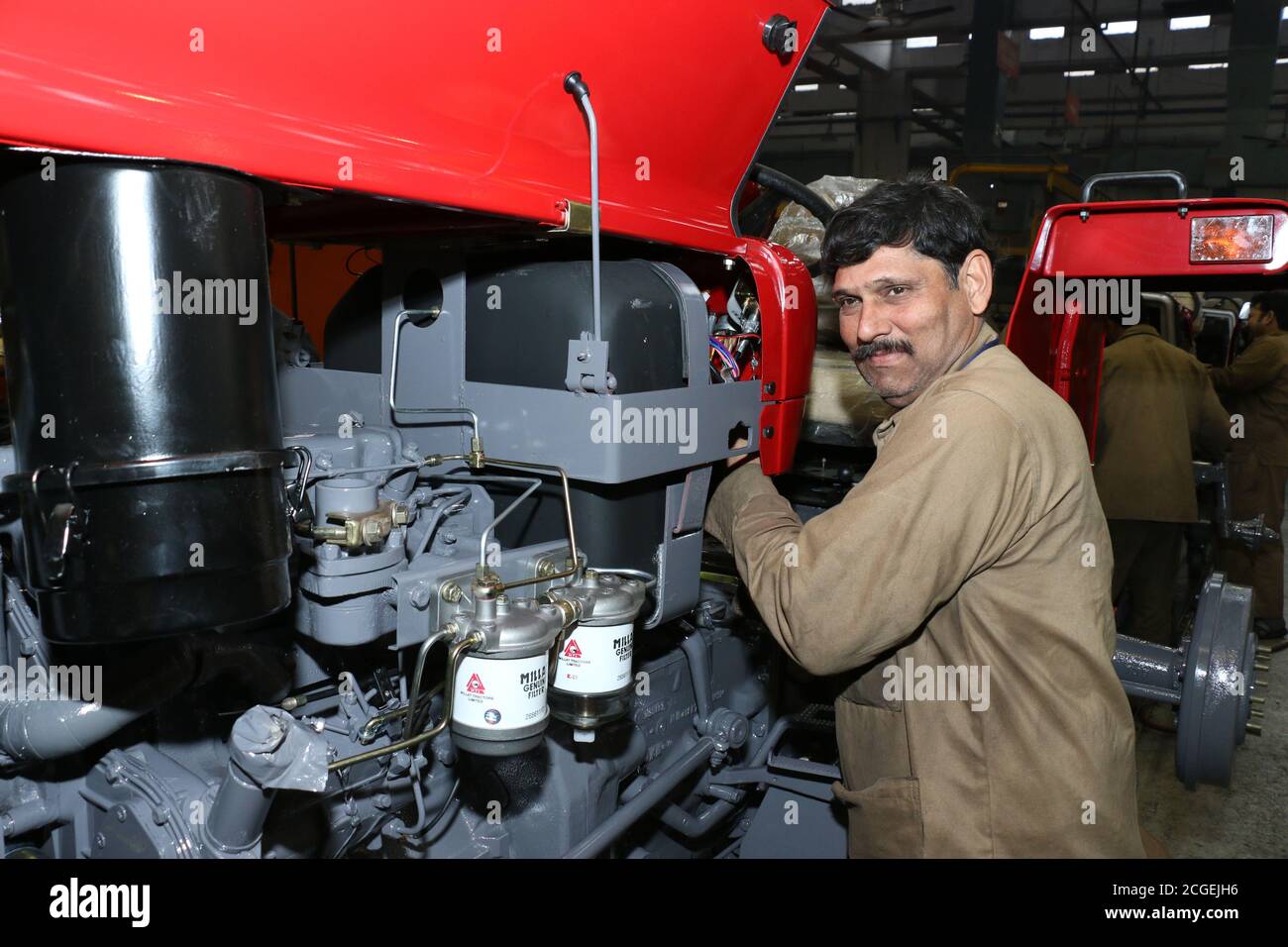 assembly stage the body of millat tractor at factory and tractor parts ...