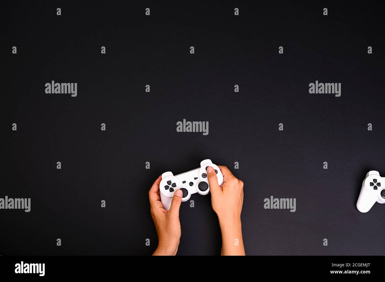Computer game competition. Gaming concept. White joysticks on a black ...