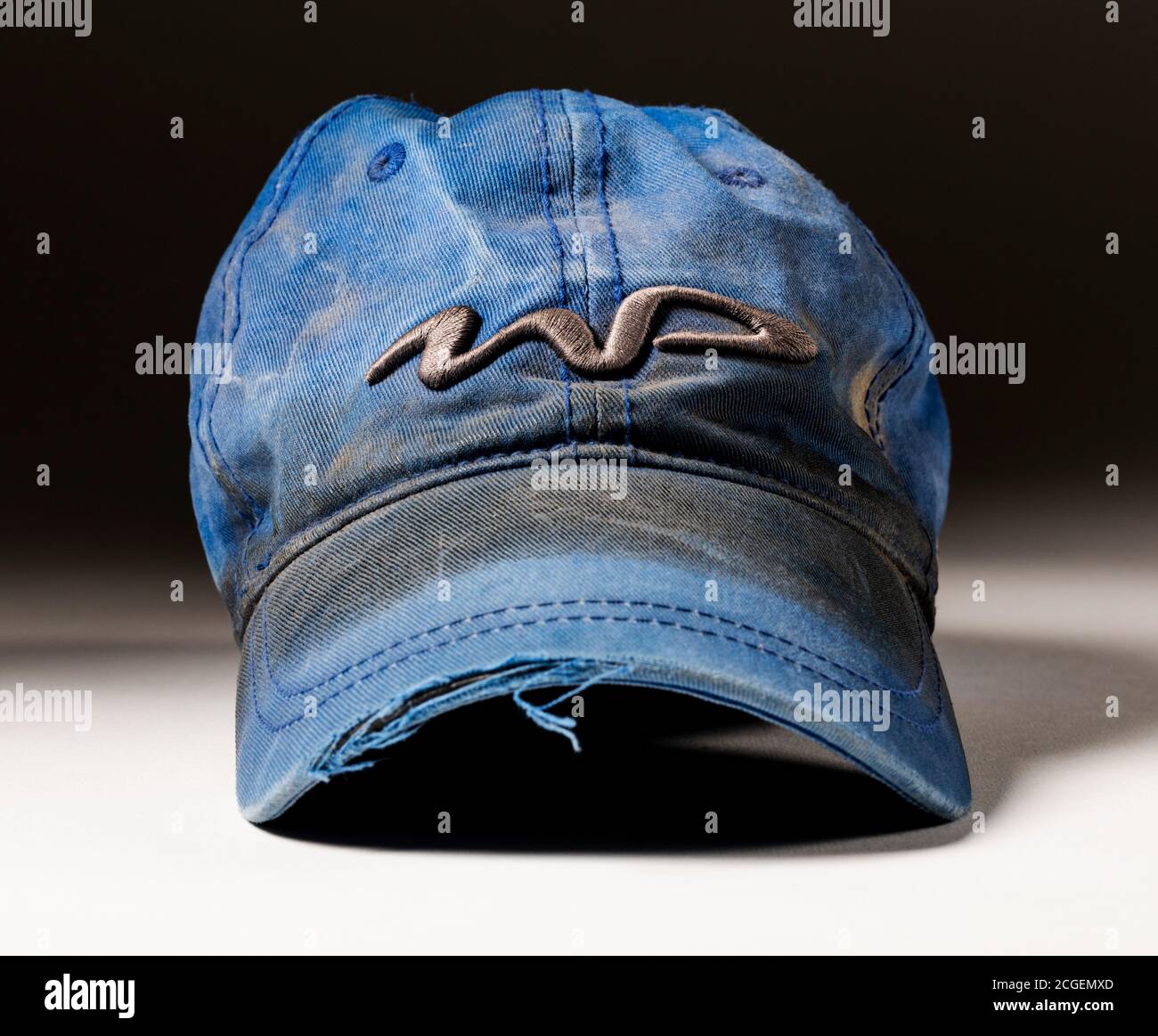 Studio still life of old worn & dirty baseball hat Stock Photo - Alamy