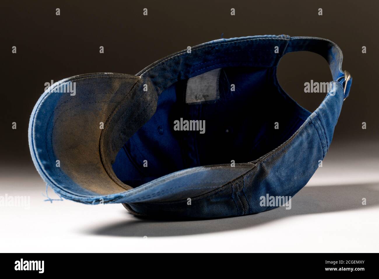 Studio still life of old worn & dirty baseball hat Stock Photo - Alamy