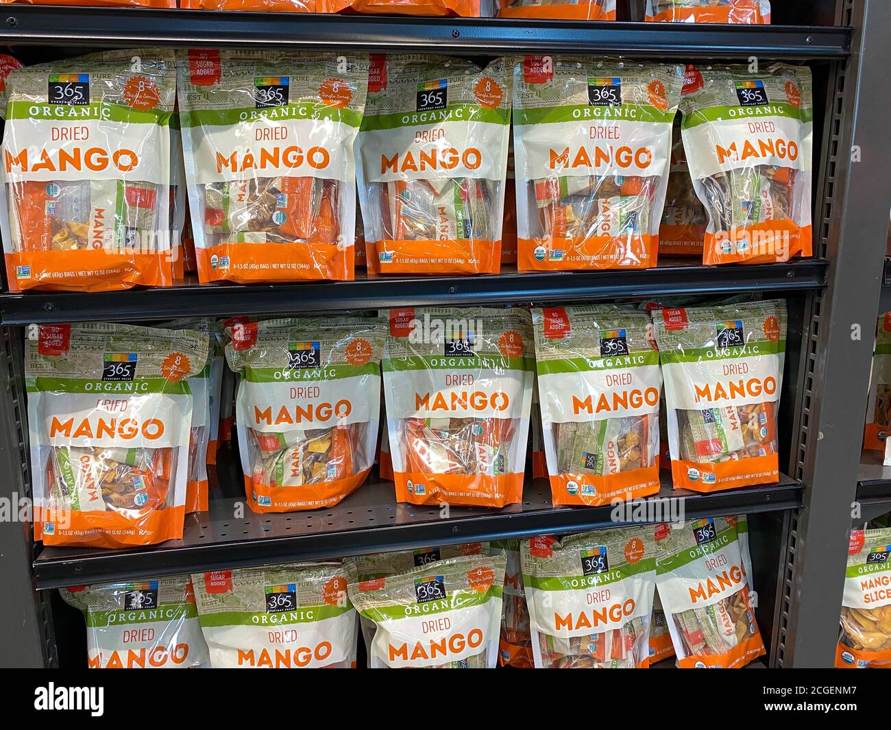Orlando, FL/USA-5/10/20: A display of 365 Dried Mango snack packages at ...