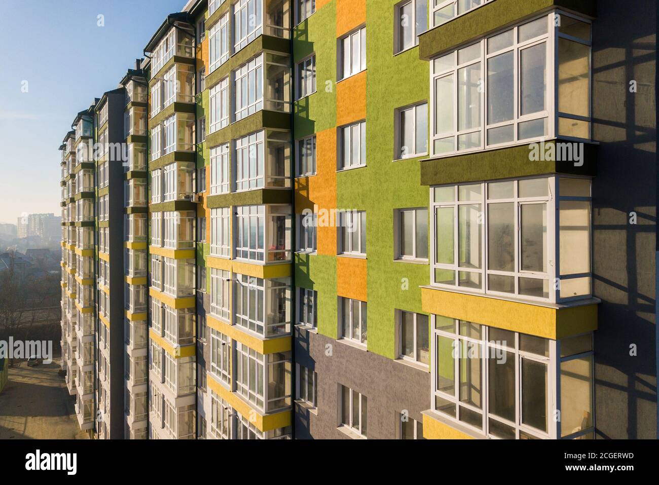Aerial view of a tall residential apartment building with many windows ...