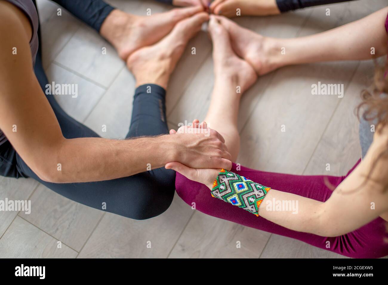 Happy group people stretching hands hi-res stock photography and images ...