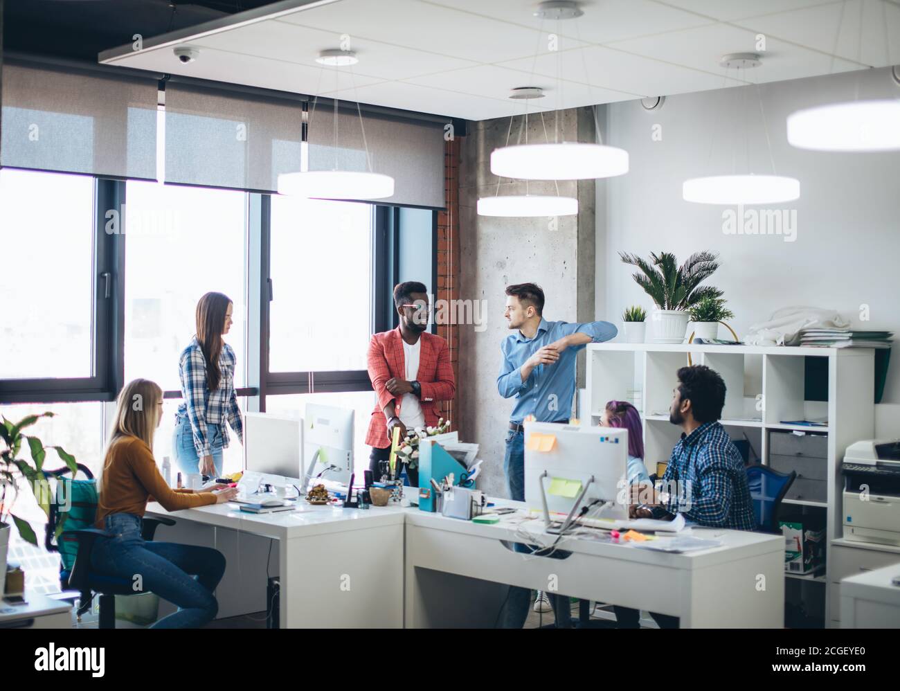 Indoor shot of loft modern business office interior with working stuff ...