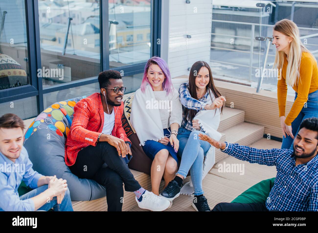 Non-formal business meeting of young talanted top photographers. Top ...