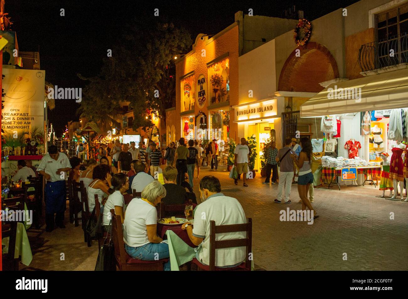 Street scene of 5th Avenue at night in Playa del Carmen on the Riviera ...