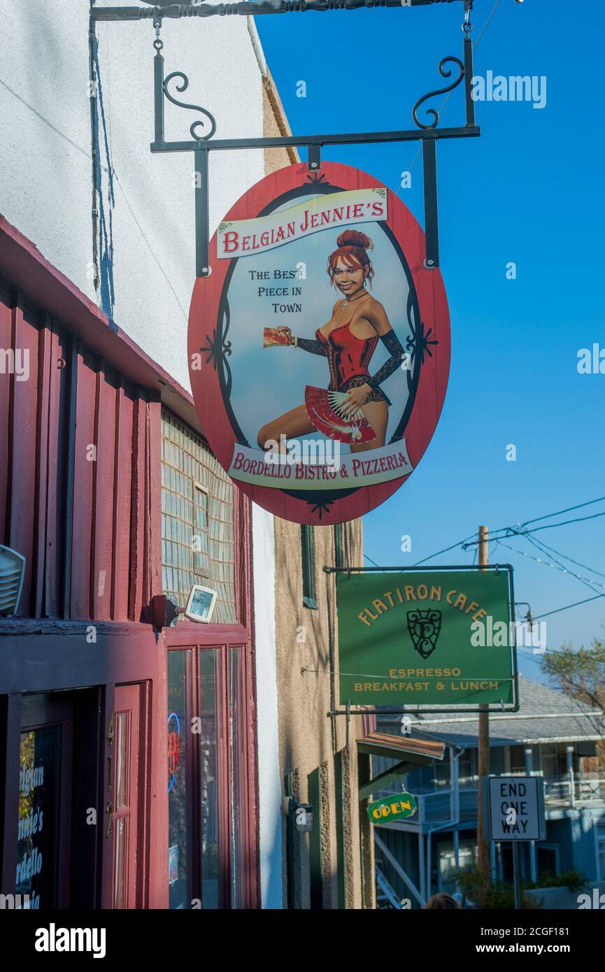 A street scene with a cafe sign in the old mining town of Jerome in ...